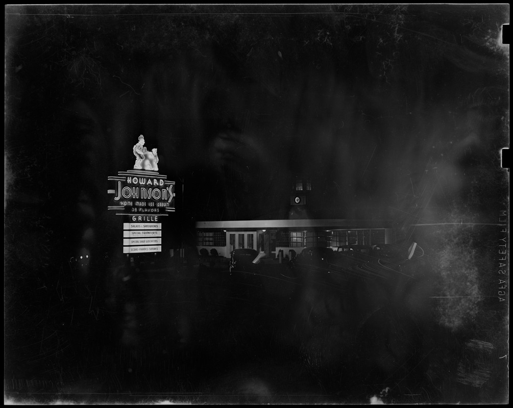 Howard Johnson's restaurant seen at night with neon "Howard Johnson's ...