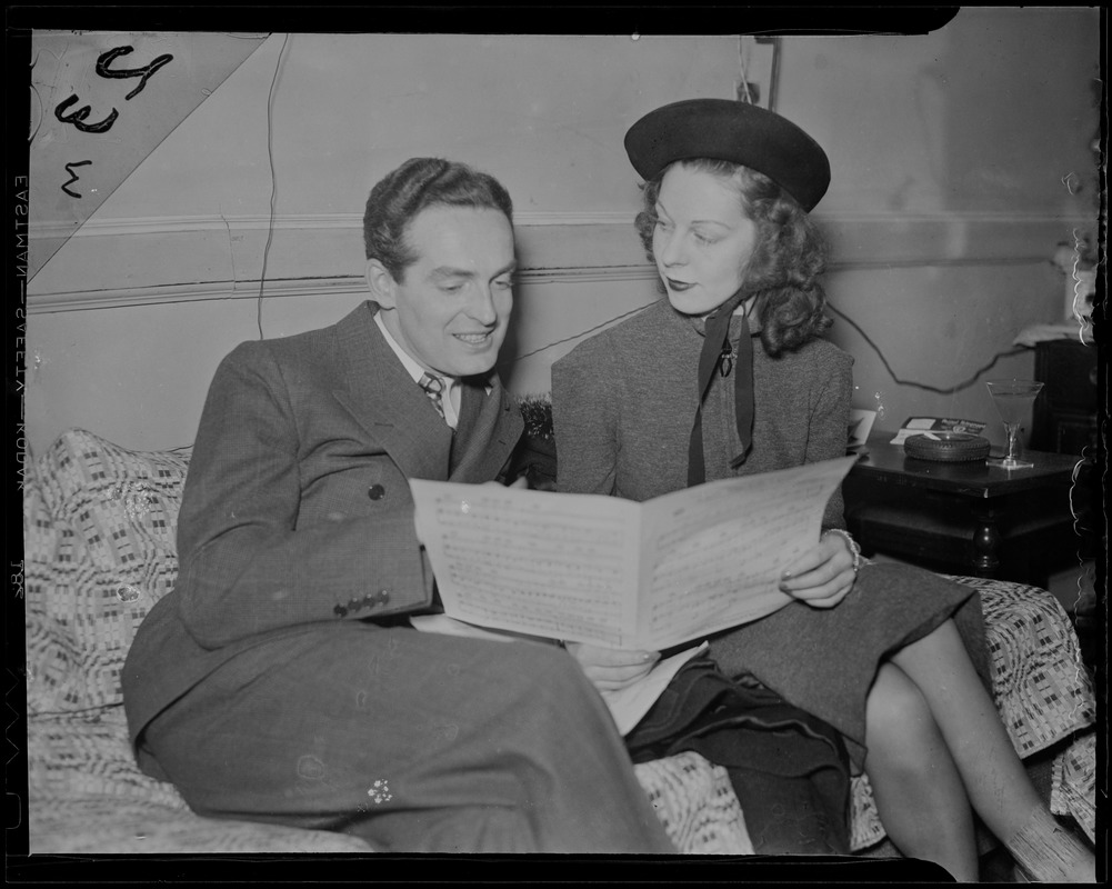 Fred Waring and another woman, most likely Ann Marsters, looking ...