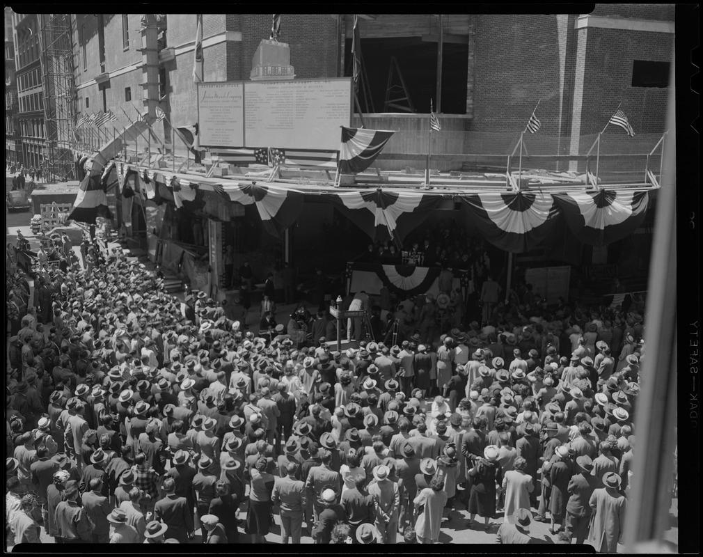Aerial view of a view of the crowd standing before a podium - Digital ...
