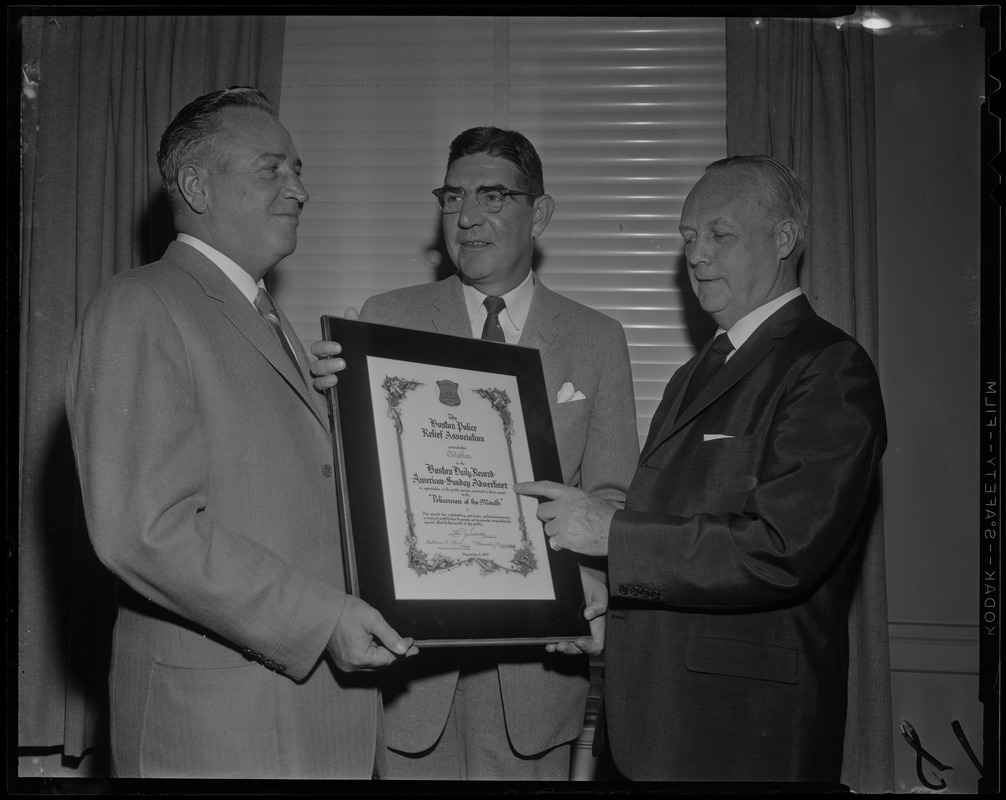 Mark F. Collins accepts Police Association award from Commr. Sullivan ...