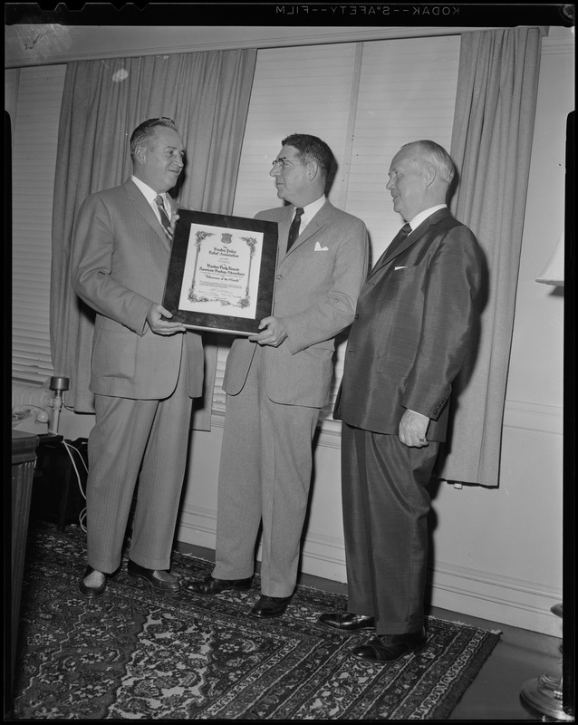 Mark F. Collins accepts Police Association award from Commr. Sullivan ...