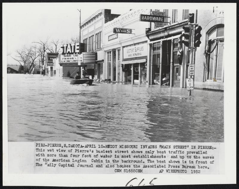 Muddy Missouri Invades Main Street in Pierre: - This wet view of Pierre ...
