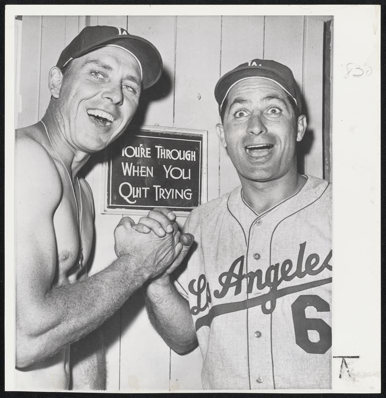 Gil Hodges (Left) and Carl Furillo come to grips in joy as the Los ...