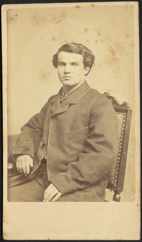 Edward Myron Stevens seated in chair - Digital Commonwealth