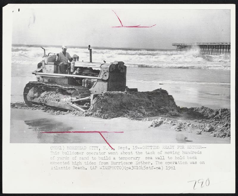 Getting Ready for Esther -- This bulldozer operator went about the task ...