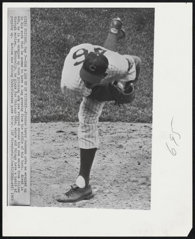 Has a Leg Up On Victory--Pitcher Larry Jackson gets so wrapped up in ...