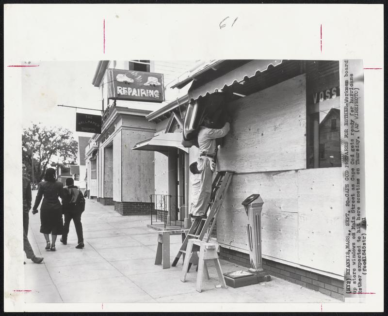 Cape Cod Prepares For Esther -- Workmen board up store windows on Main ...