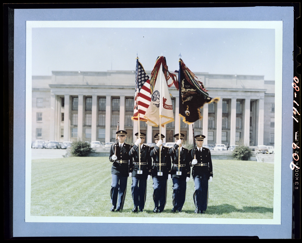 Soldiers marching with flags - Digital Commonwealth