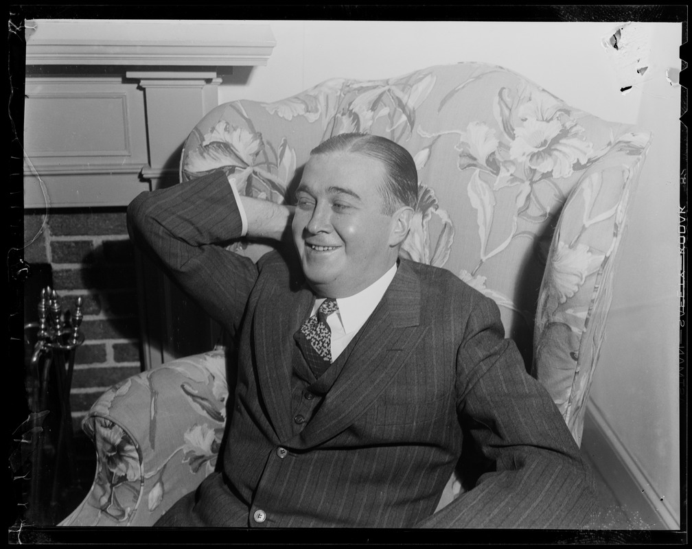 Paul Dever sitting in chair - Digital Commonwealth