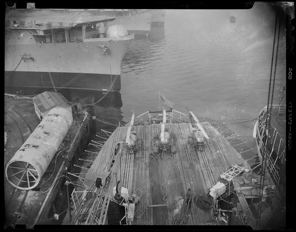 Deck of the USS Atka while in the harbor - Digital Commonwealth