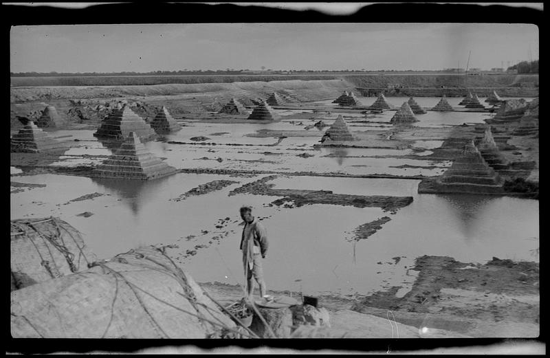 Excavation project. Pyramids show how much dirt has been removed by ...