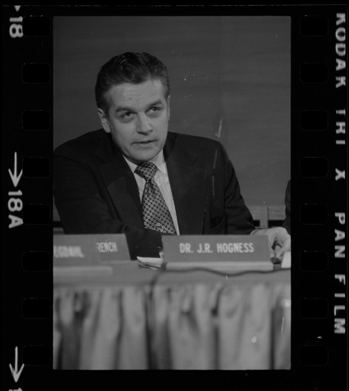Dr. J.R. Hogness speaking at a symposium at B.U. Medical Center ...