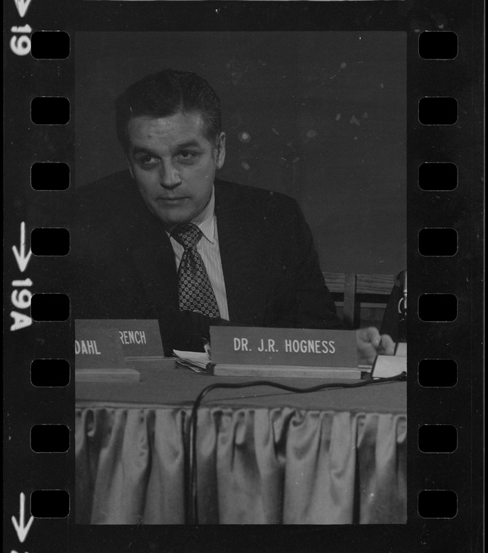 Dr. J.R. Hogness speaking at a symposium at B.U. Medical Center ...