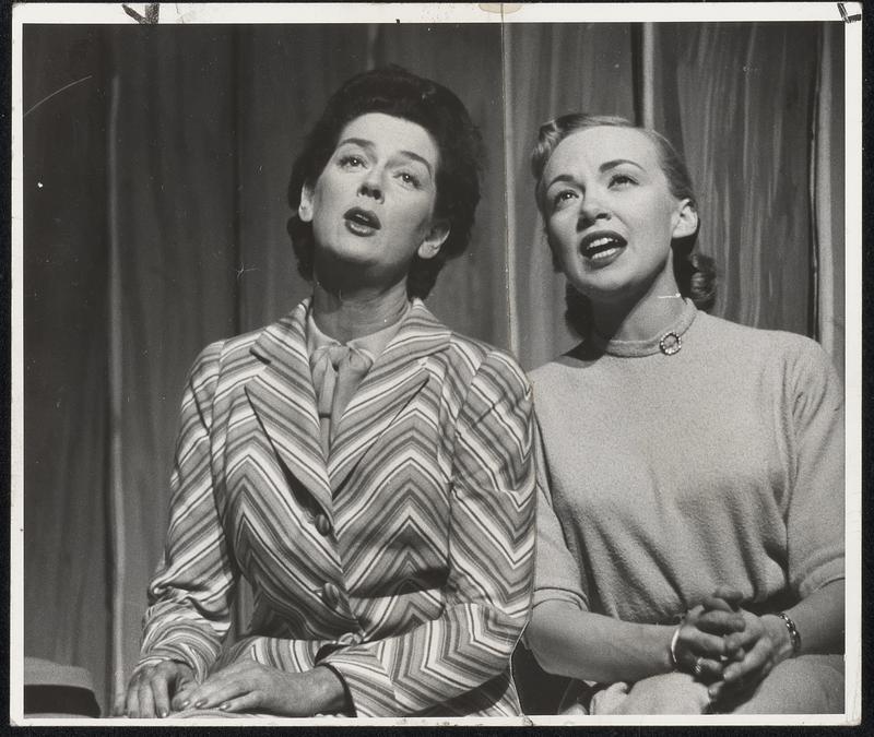 Rosalind Russell as Ruth and Edith Adams as her sister Eileen sing of ...