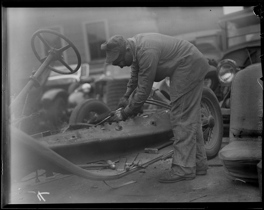 Scrap iron for war effort, WWII - Digital Commonwealth