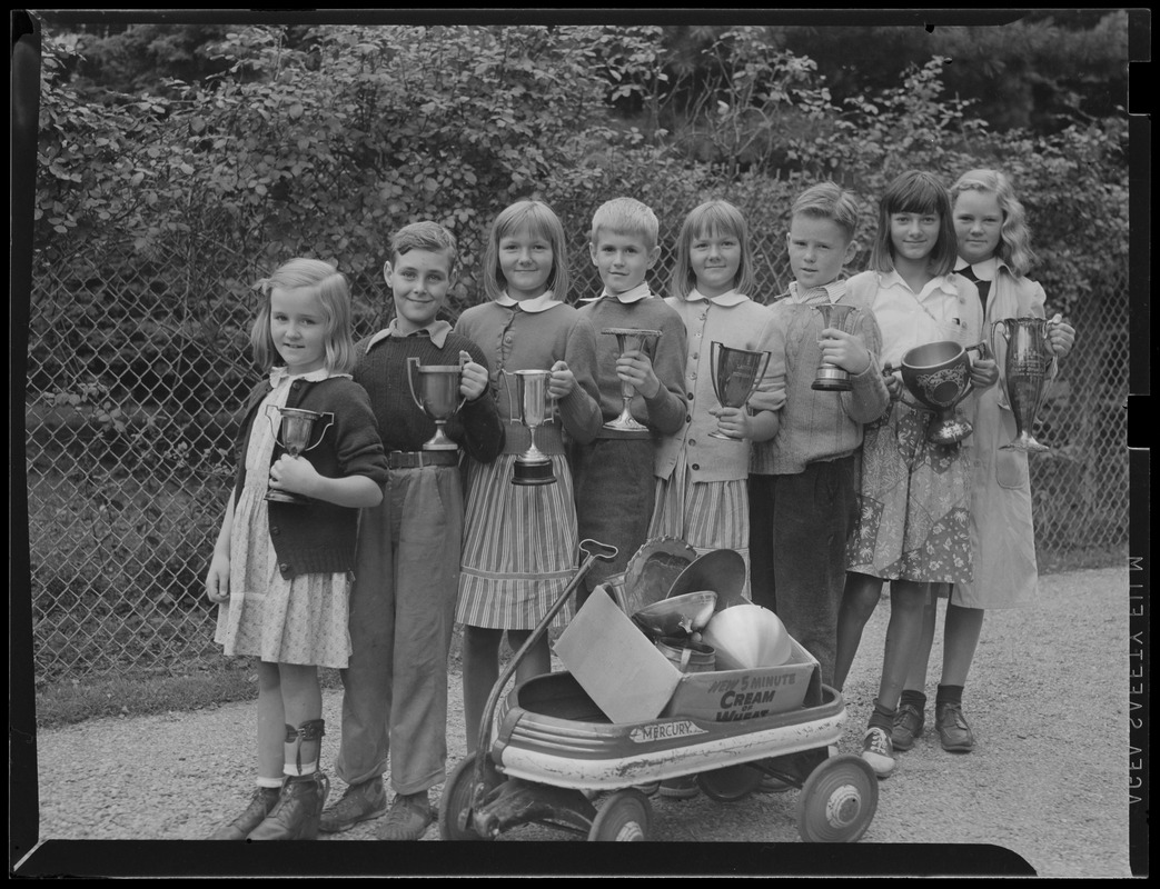 WWII: Eight children - scrap metal collection? - Digital Commonwealth