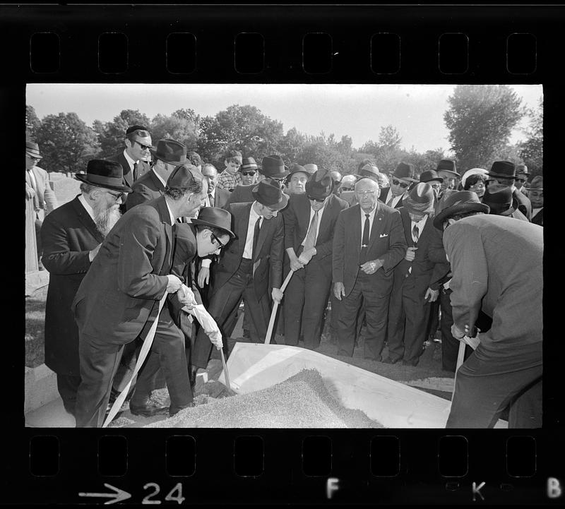 Jewish men bury fire-damaged Torah scrolls, Mattapan - Digital Commonwealth