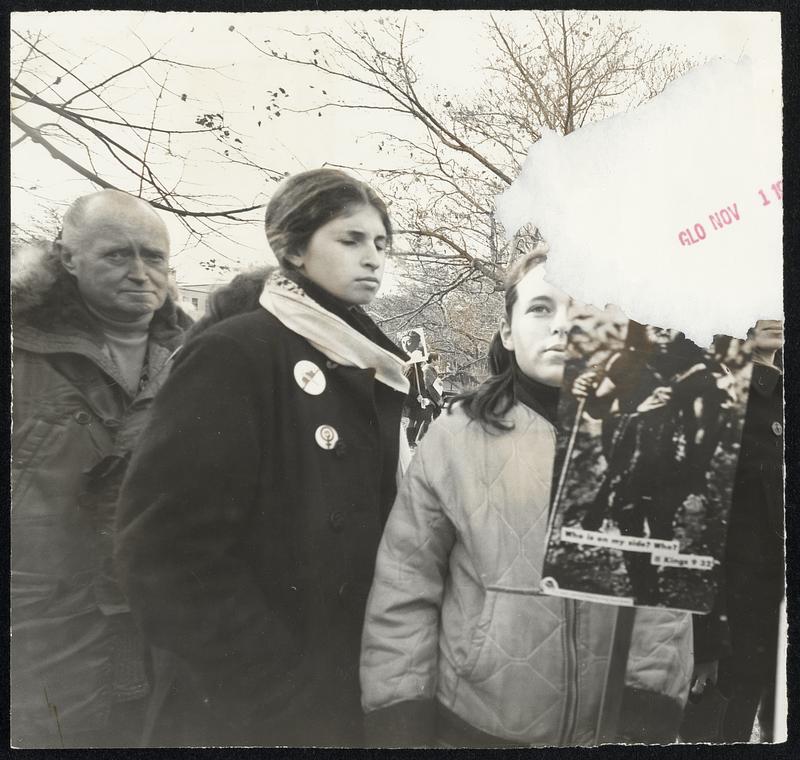 Two unidentified young women and one man, probably at a demonstration - Digital Commonwealth
