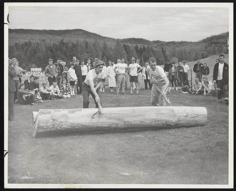 Log Rollers -- Two Dartmouth students use peaveys to maneuver a ton log ...