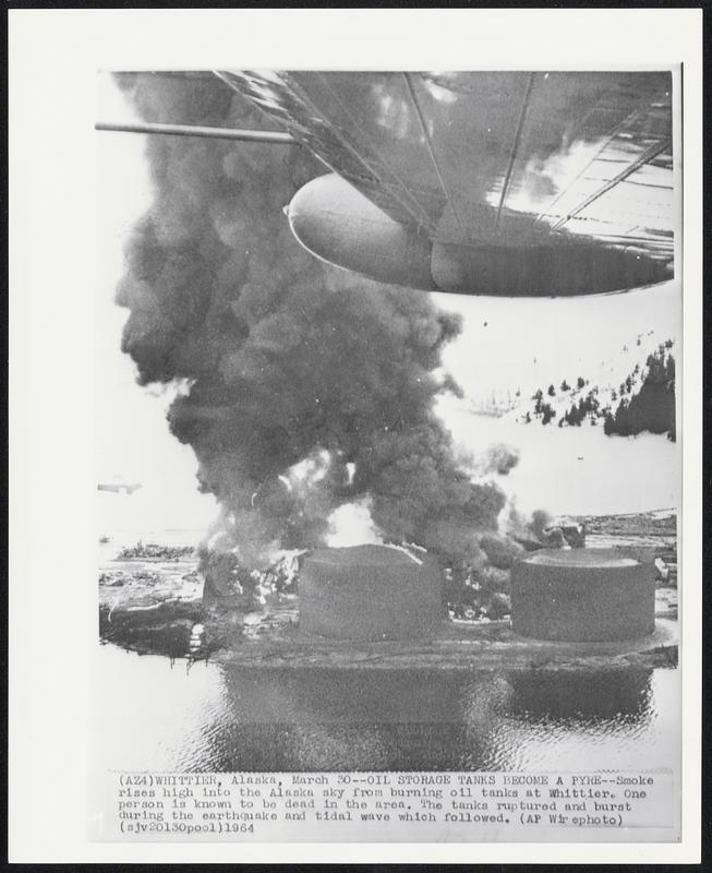 Oil Storage Tanks Become a Pyre -- Smoke rises high into the Alaska sky ...