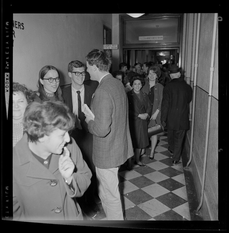 Line and crowd forming in the hallway of courthouse - Digital Commonwealth