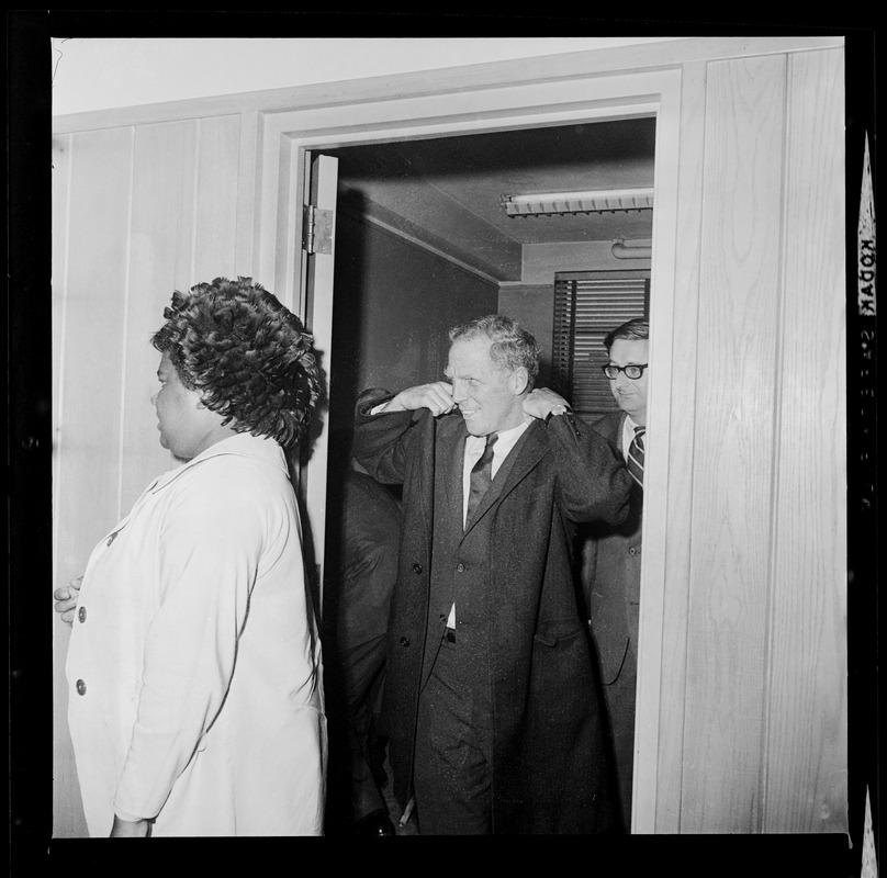 A busy Mayor Kevin White entering with his Press Secretary Richard ...