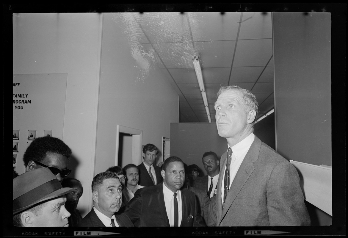 Mayor White talking to a group of people in the hallway - Digital ...