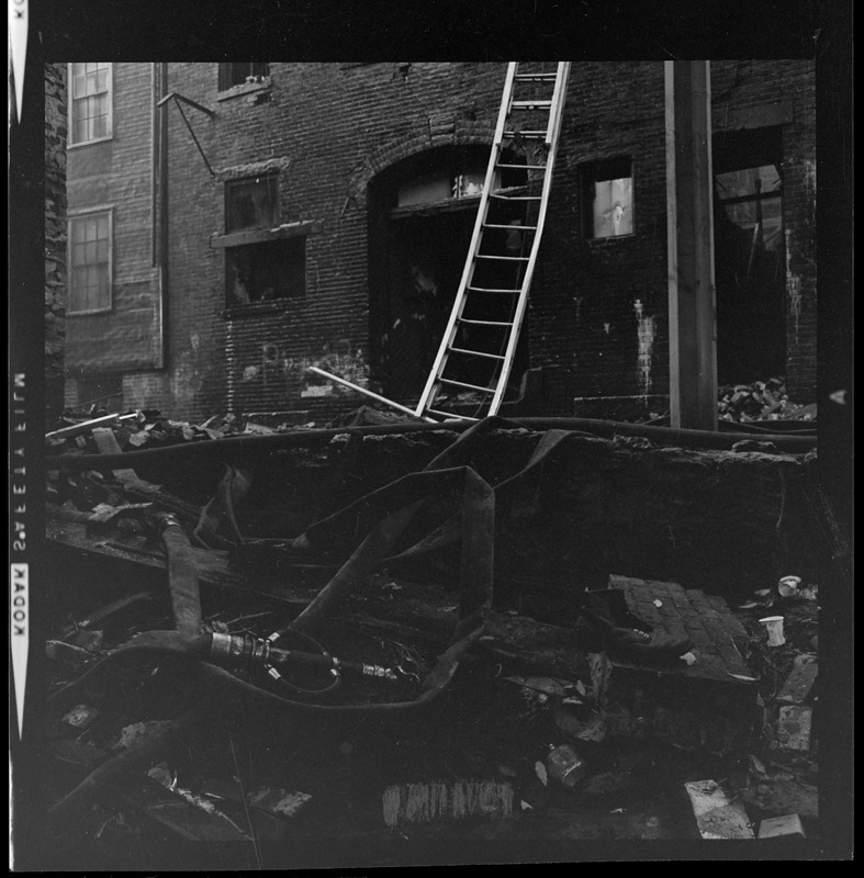 Debris after the fire caused a building to collapse - Digital Commonwealth