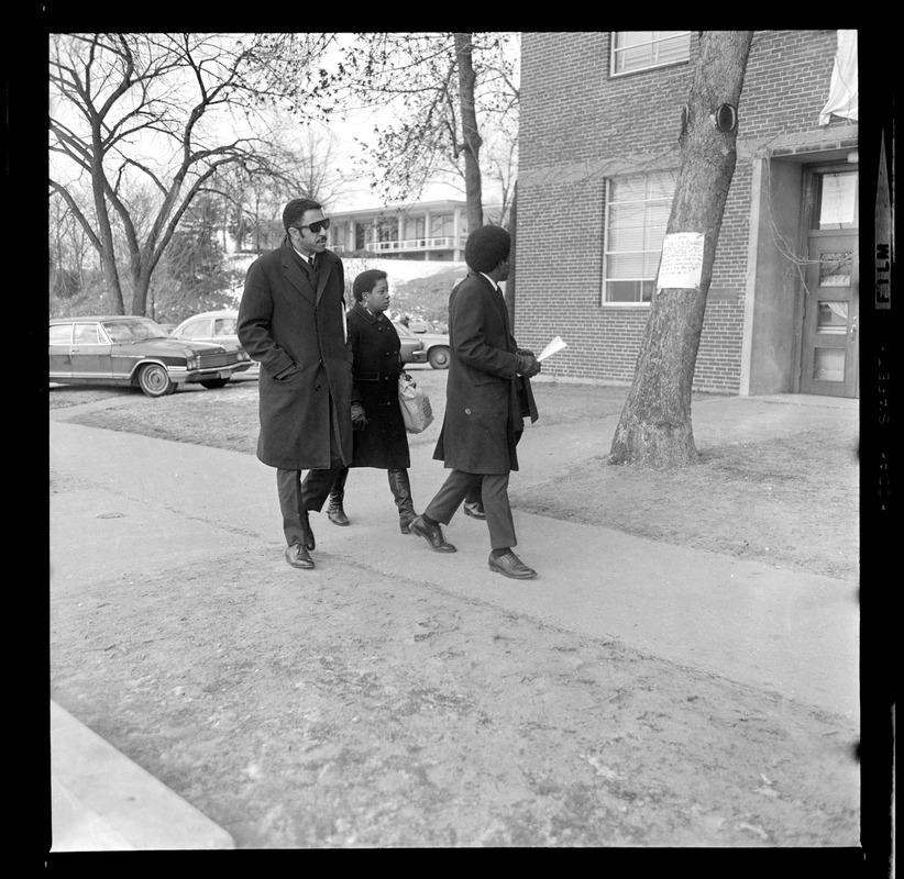 Group of people walking along a path - Digital Commonwealth