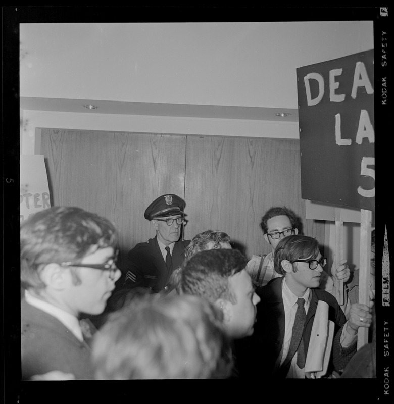 Officer surrounded by student protesters at MIT - Digital Commonwealth