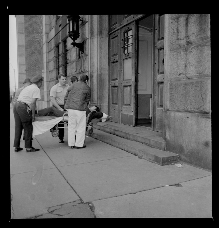 Officers transporting escaped prisoner Robert Barry on a stretcher by ...