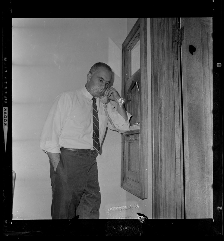 Francis X. Bellotti on the phone in his home - Digital Commonwealth
