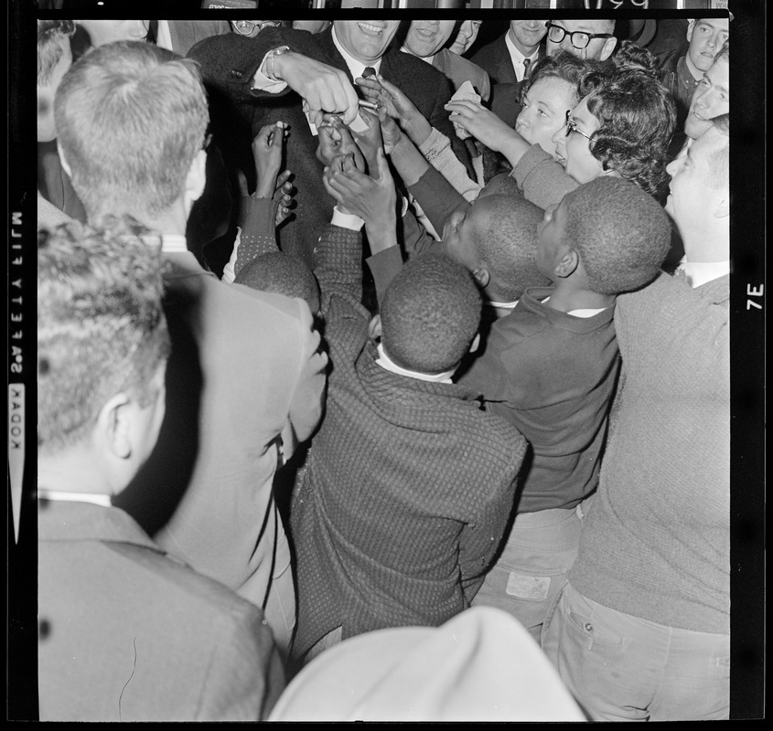 People reaching out to get an autograph from evangelist Dr. Billy ...