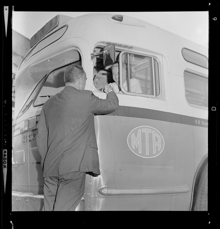 Lt. Gov. Bellotti talking with an MTA bus driver - Digital Commonwealth