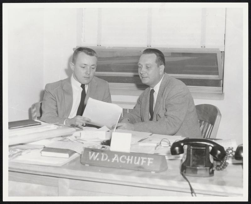 L. to R; George Mingels discussing with Principal Correction Officer ...