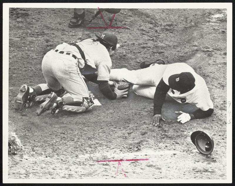 Milwaukee Brewers catcher Ellie Rodríguez tags out Boston Red Sox first ...