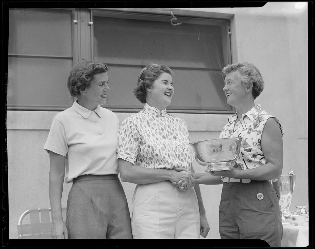 Woman receives trophy - Digital Commonwealth