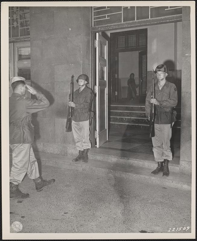 MPs stand guard in front of the 27th Division command post building in ...