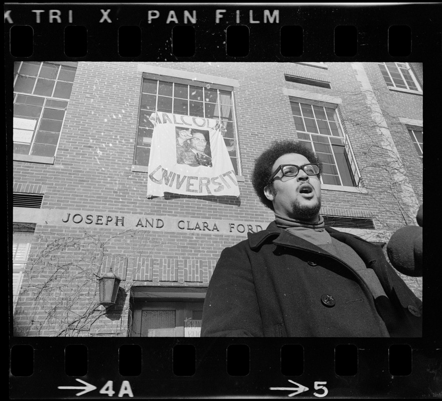 Randall Bailey outside of Ford Hall talking to press during Brandeis ...