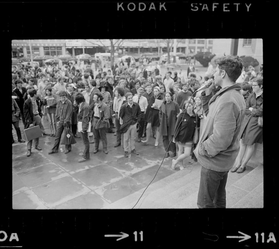 Student addressing crowd during rally in support of SDS members at ...