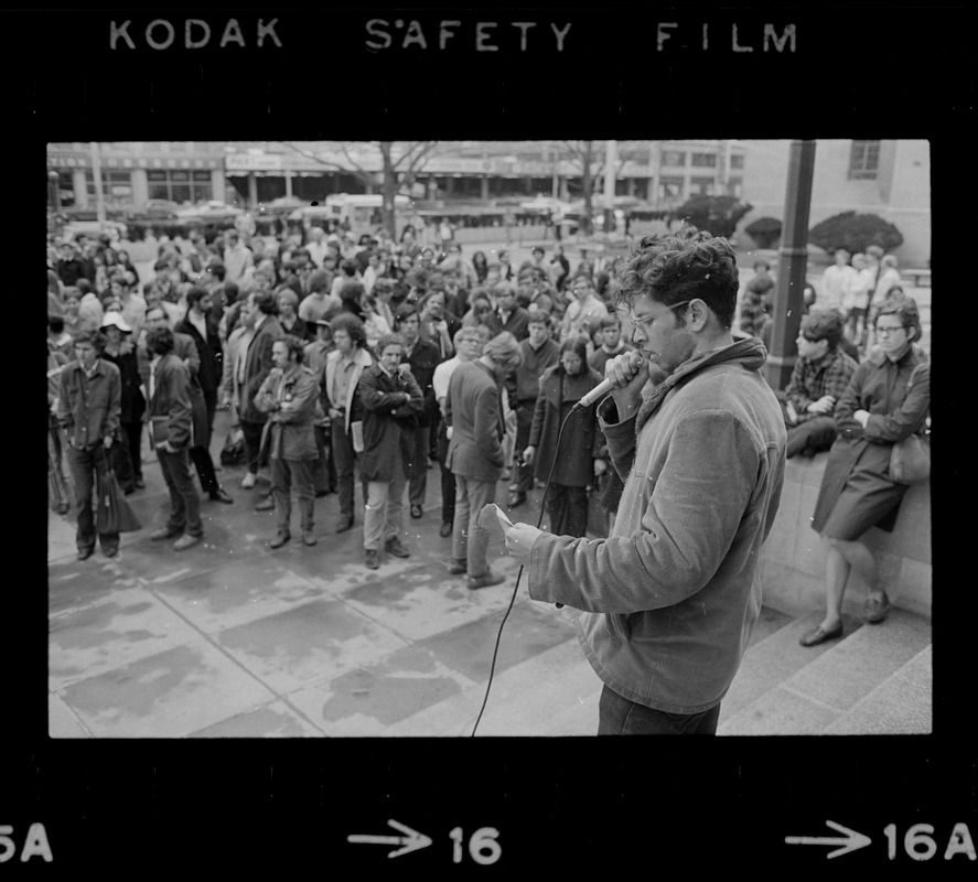 Student addressing crowd during rally in support of SDS members at ...