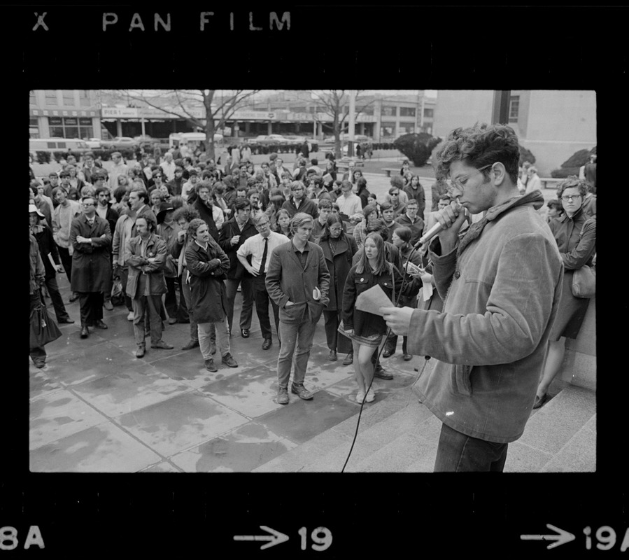 Student addressing crowd during rally in support of SDS members at ...