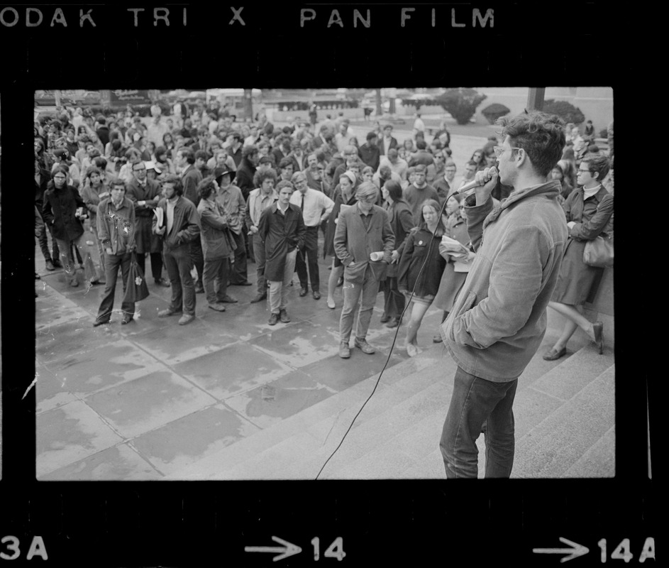 Student addressing crowd during rally in support of SDS members at ...