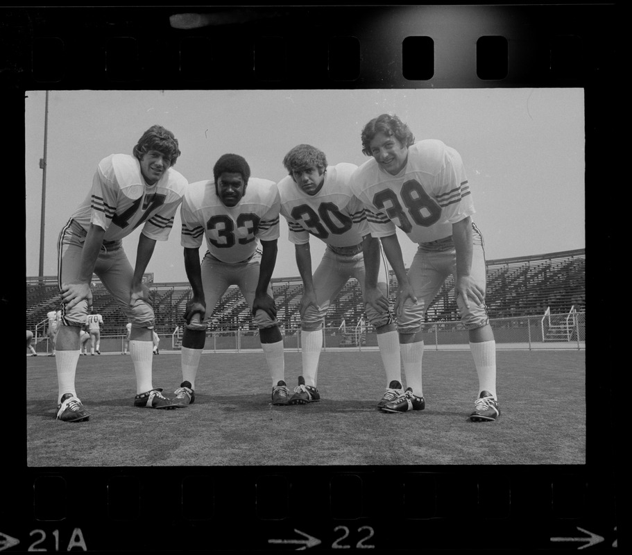Boston College quarterback Joe Pandolfo (17), far left, and co-captain ...