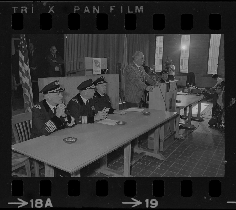 Police commissioner Edmund McNamara at podium speaking during ceremony ...