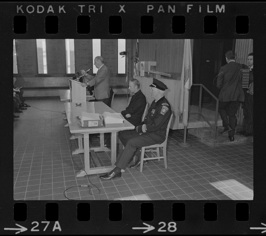Police commissioner Edmund McNamara at podium speaking during ceremony ...