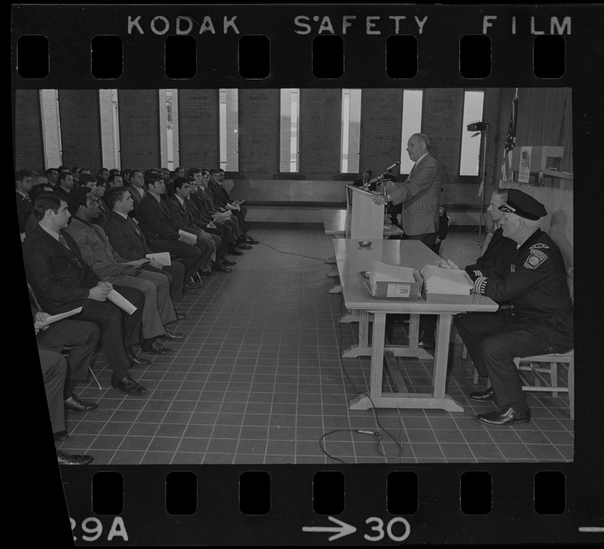 Police commissioner Edmund McNamara at podium speaking during ceremony ...