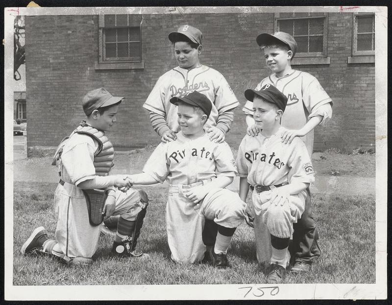 Brighton Little Leaguers, wearing street clothes, line up to register ...