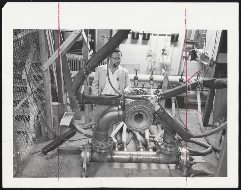 Super Magnet - Dr. Henry H. Kolm of MIT shown with magnet he invented ...