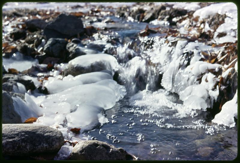 Melting ice by running water and rocks - Digital Commonwealth